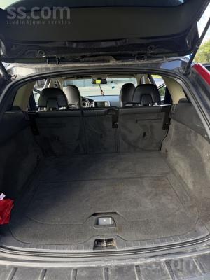 Black Volvo XC60 2011 in Liepaja, with an engine capacity of 2.40 L and mileage of 292 thousand km for 8150 €, photo 15 on AUTOMOTO.COM.LV