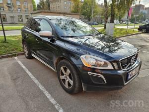 Black Volvo XC60 2011 in Riga, with an engine capacity of 2.40 L and mileage of 315 thousand km for 7000 €, photo 5 on AUTOMOTO.COM.LV