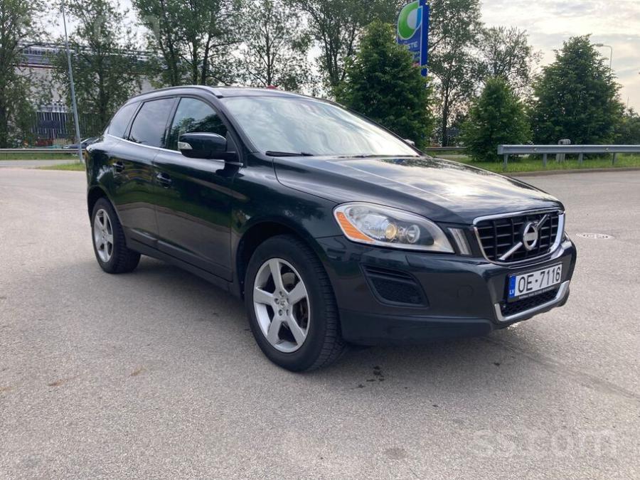 Black Volvo XC60 2012 in Riga, with an engine capacity of 2.40 L and mileage of 217 thousand km for 10900 €, photo 2 on AUTOMOTO.COM.LV