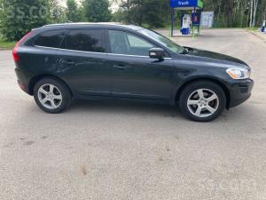 Black Volvo XC60 2012 in Riga, with an engine capacity of 2.40 L and mileage of 217 thousand km for 10900 €, photo 3 on AUTOMOTO.COM.LV