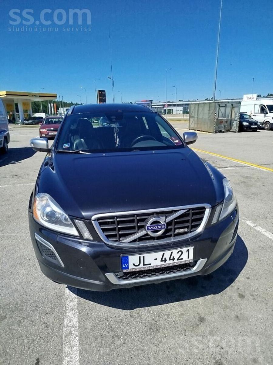 Black Volvo XC60 2012 in Riga, with an engine capacity of 2.20 L and mileage of 254 thousand km for 9900 €, photo 1 on AUTOMOTO.COM.LV