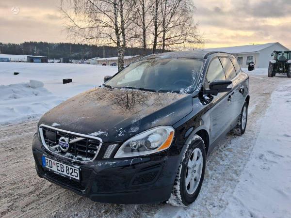 Black Volvo XC60 2012 in Vilnius, with an engine capacity of 2.40 L and mileage of 270 thousand km for 9850 €, photo 2 on AUTOMOTO.COM.LV