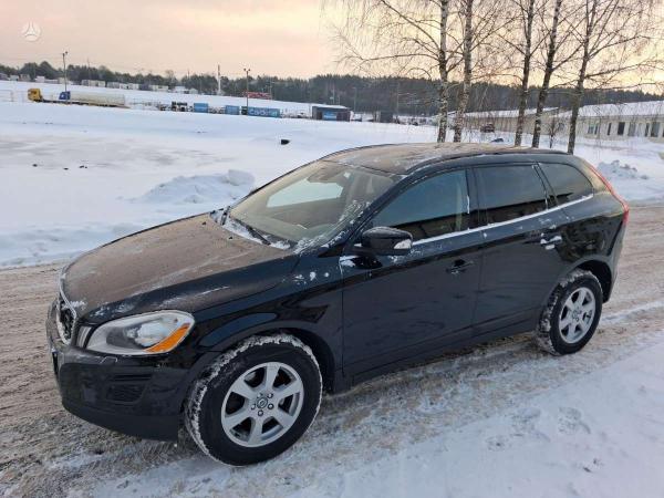 Black Volvo XC60 2012 in Vilnius, with an engine capacity of 2.40 L and mileage of 270 thousand km for 9850 €, photo 3 on AUTOMOTO.COM.LV