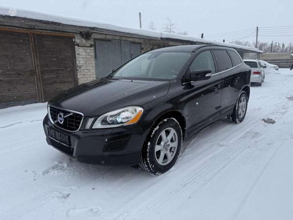 Black Volvo XC60 2012 in Marijampole, with an engine capacity of 2.40 L and mileage of 265 thousand km for 7950 €, photo 1 on AUTOMOTO.COM.LV