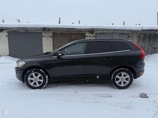 Black Volvo XC60 2012 in Marijampole, with an engine capacity of 2.40 L and mileage of 265 thousand km for 7950 €, photo 6 on AUTOMOTO.COM.LV