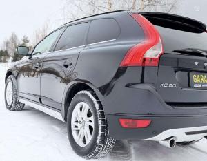 Black Volvo XC60 2012 in Siauliai, with an engine capacity of 2.40 L and mileage of 264 thousand km for 11999 €, photo 7 on AUTOMOTO.COM.LV