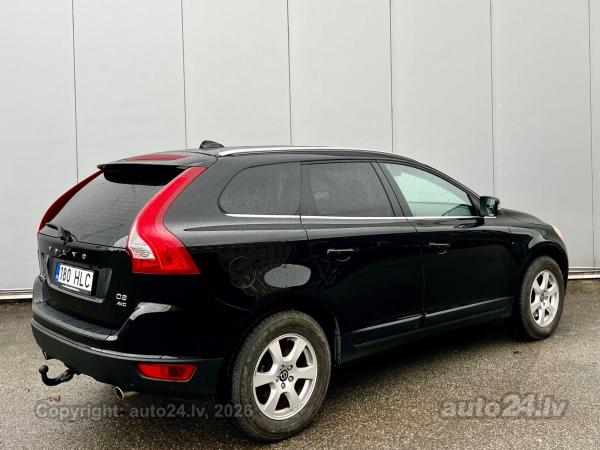 Black Volvo XC60 2012 in Tallinn, with an engine capacity of 2.40 L and mileage of 264 thousand km for 9999 €, photo 5 on AUTOMOTO.COM.LV