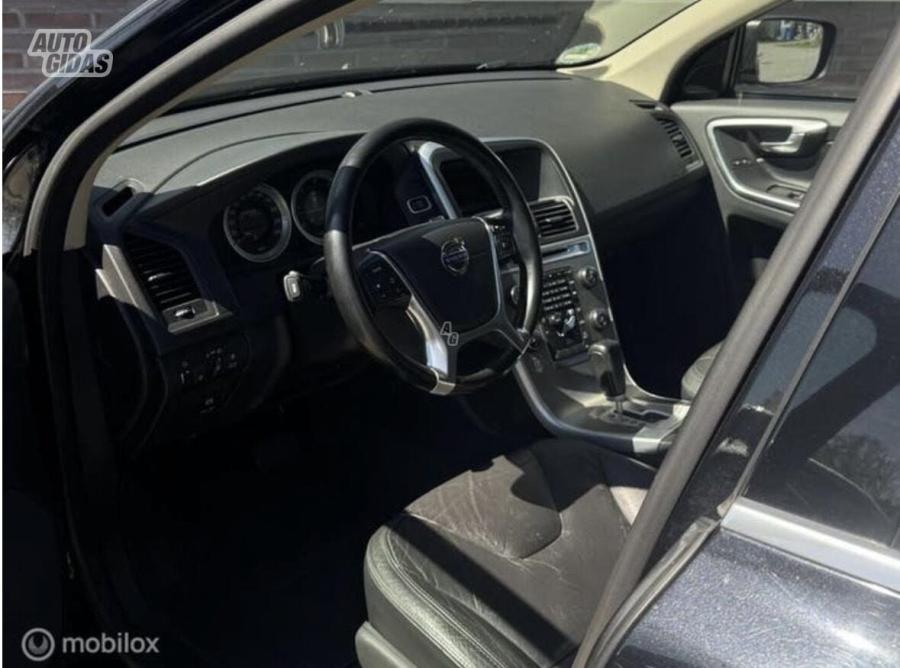 Black Volvo XC60 2012 in Kaunas, with an engine capacity of 2.00 L and mileage of 292 thousand km for 9350 €, photo 6 on AUTOMOTO.COM.LV