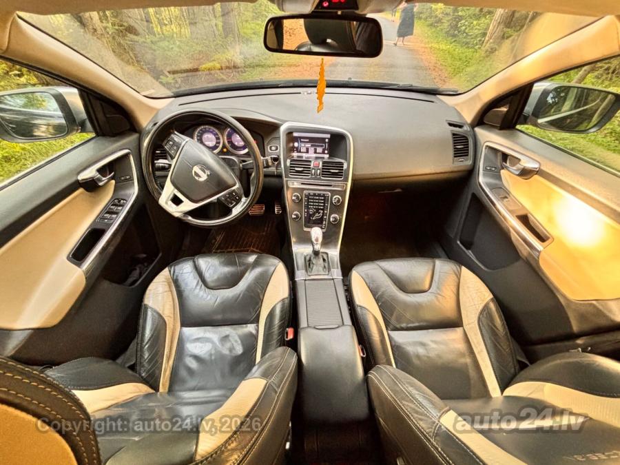 Black Volvo XC60 2012 in Tallinn, with an engine capacity of 2.40 L and mileage of 462 thousand km for 7500 €, photo 10 on AUTOMOTO.COM.LV