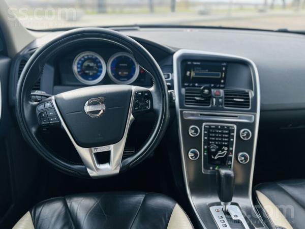 Black Volvo XC60 2012 in Daugavpils, with an engine capacity of 2.40 L and mileage of 272 thousand km for 9950 €, photo 7 on AUTOMOTO.COM.LV