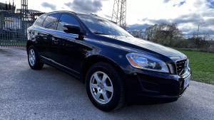 Black Volvo XC60 2012 in Riga, with an engine capacity of 2.00 L and mileage of 210 thousand km for 10800 €, photo 6 on AUTOMOTO.COM.LV