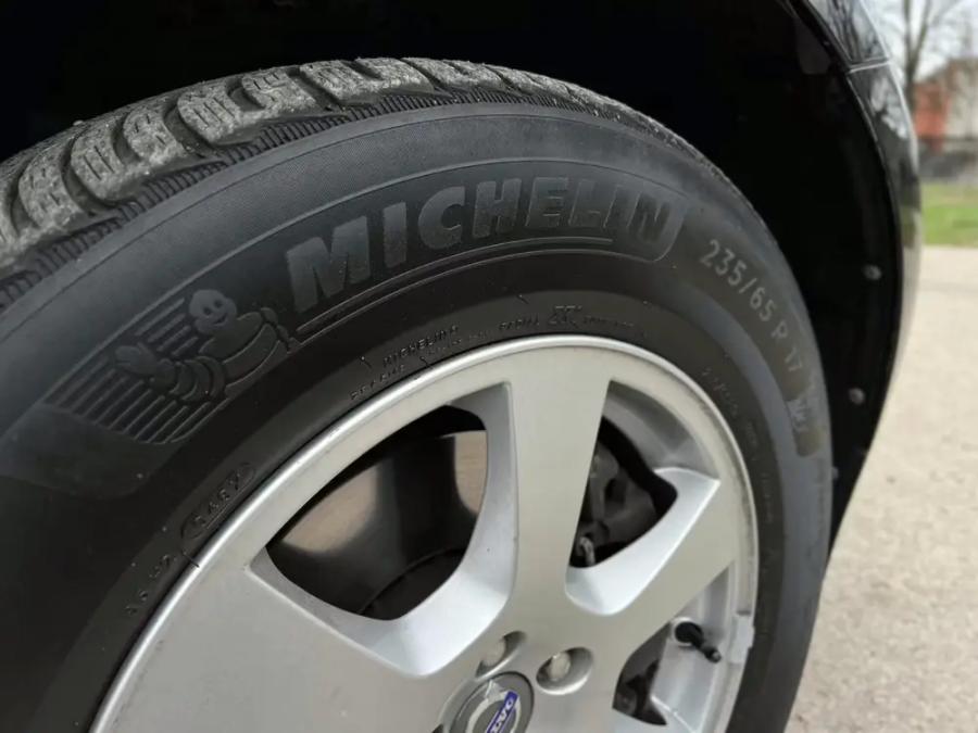 Black Volvo XC60 2012 in Riga, with an engine capacity of 2.00 L and mileage of 210 thousand km for 10800 €, photo 29 on AUTOMOTO.COM.LV