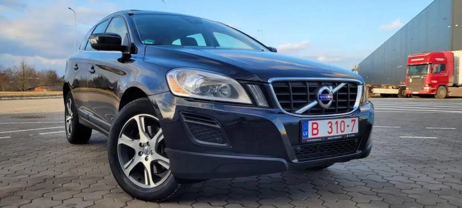 Black Volvo XC60 2012 in Riga, with an engine capacity of 2.40 L and mileage of 309 thousand km for 10900 €, photo 12 on AUTOMOTO.COM.LV