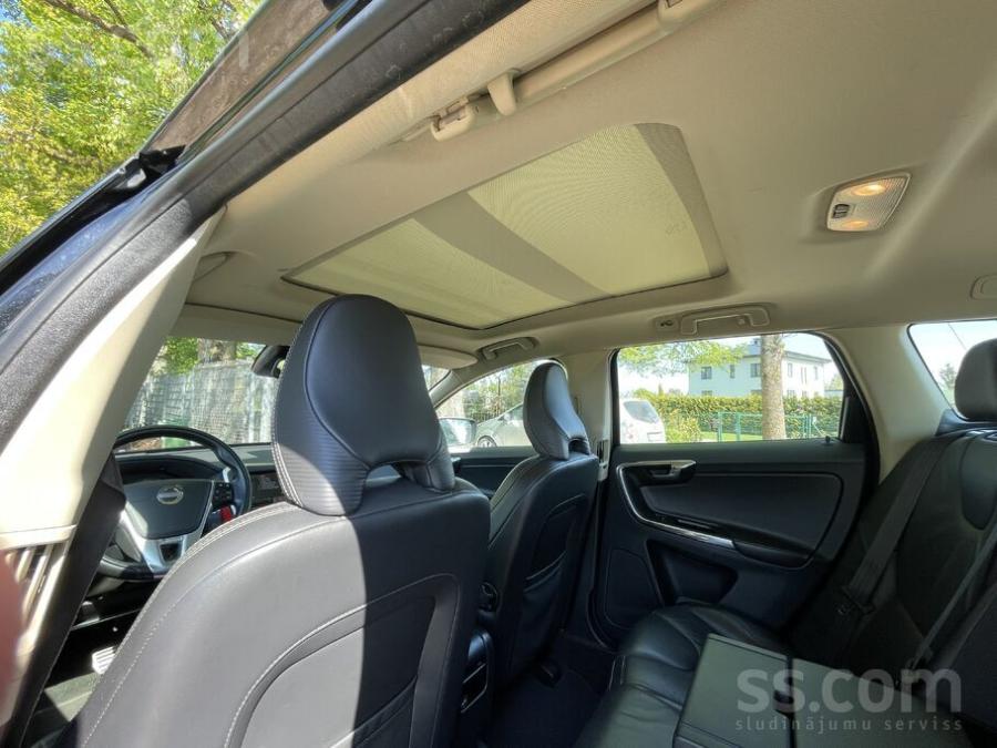 Black Volvo XC60 2012 in Riga, with an engine capacity of 2.00 L and mileage of 372 thousand km for 8990 €, photo 36 on AUTOMOTO.COM.LV