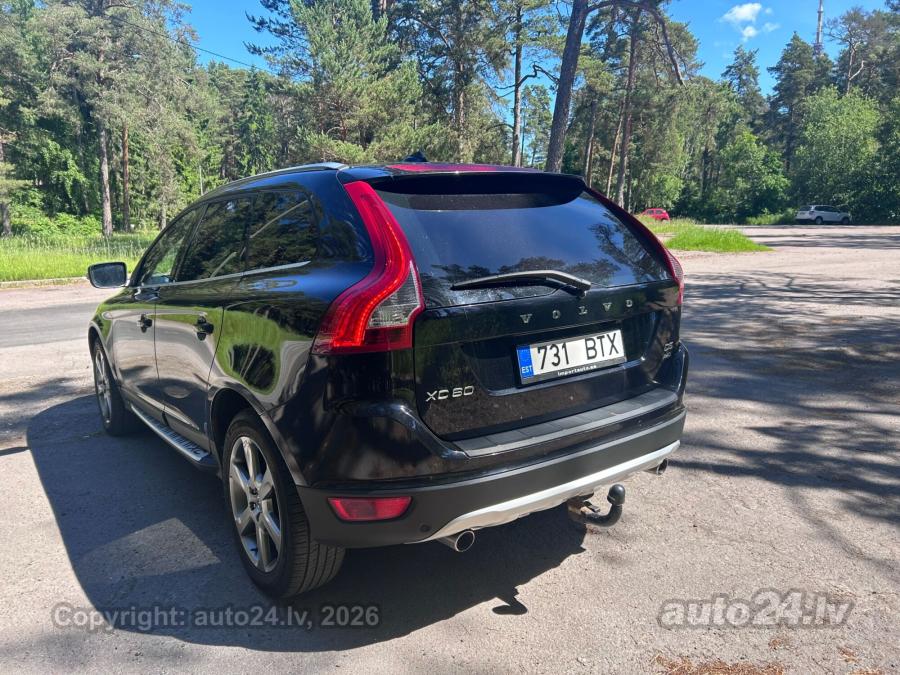 Black Volvo XC60 2012 in Tallinn, with an engine capacity of 2.40 L and mileage of 314 thousand km for 8600 €, photo 3 on AUTOMOTO.COM.LV