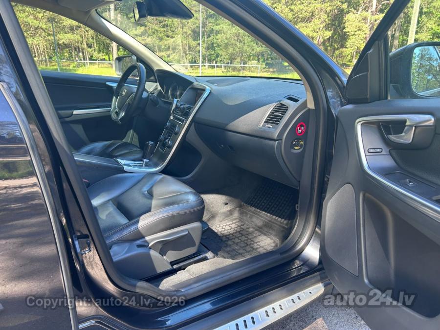 Black Volvo XC60 2012 in Tallinn, with an engine capacity of 2.40 L and mileage of 314 thousand km for 8600 €, photo 18 on AUTOMOTO.COM.LV