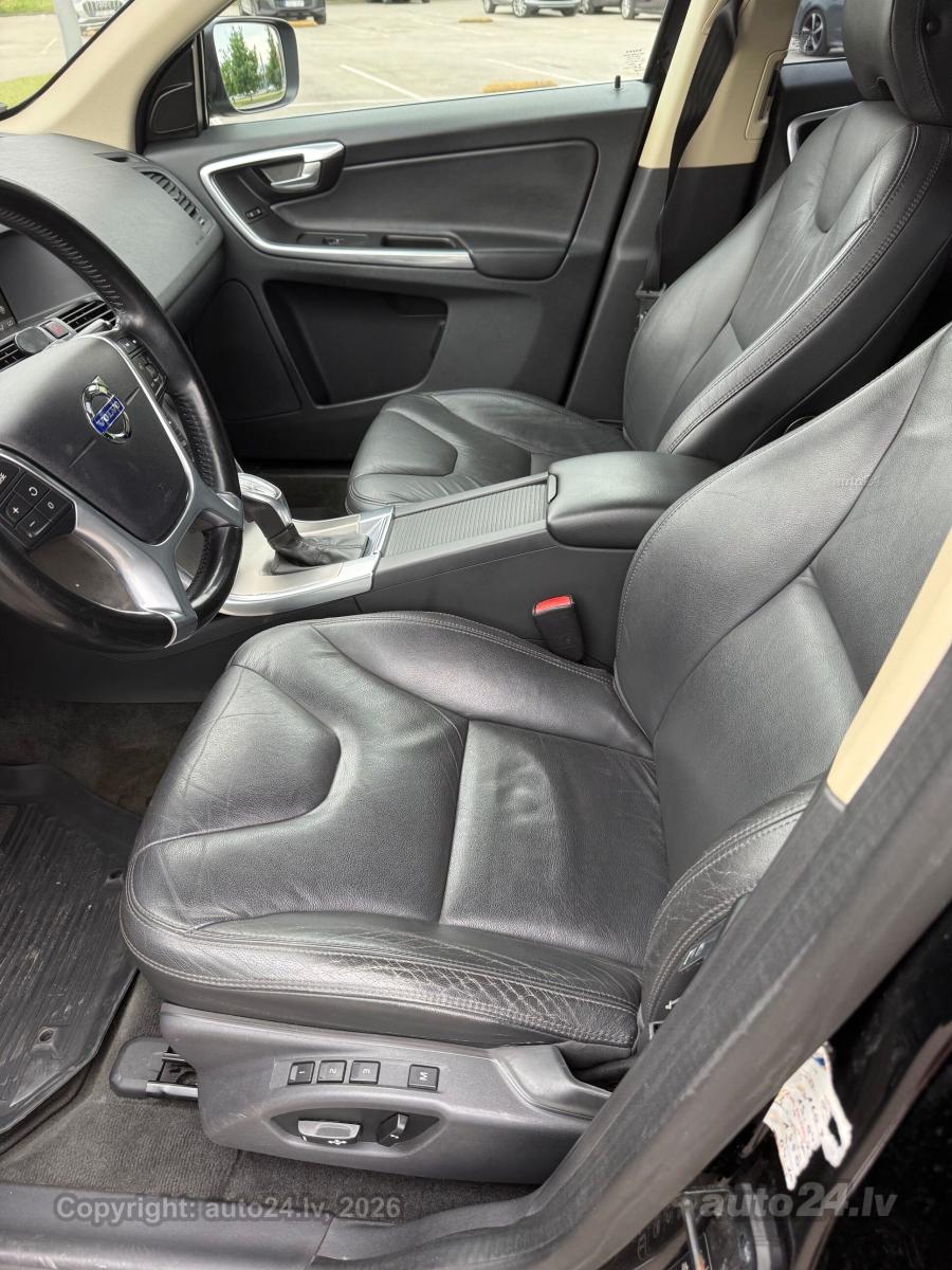 Black Volvo XC60 2012 in Tartu, with an engine capacity of 2.40 L and mileage of 185 thousand km for 12000 €, photo 14 on AUTOMOTO.COM.LV