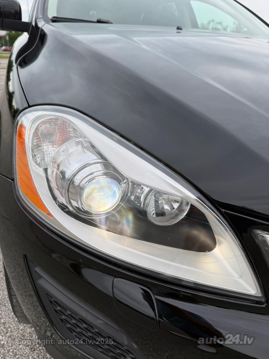 Black Volvo XC60 2012 in Tartu, with an engine capacity of 2.40 L and mileage of 185 thousand km for 12000 €, photo 18 on AUTOMOTO.COM.LV