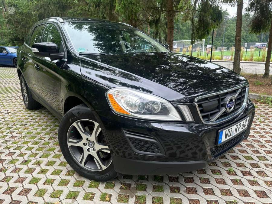 Black Volvo XC60 2012 in Vilnius, with an engine capacity of 2.40 L and mileage of 314 thousand km for 9950 €, photo 12 on AUTOMOTO.COM.LV