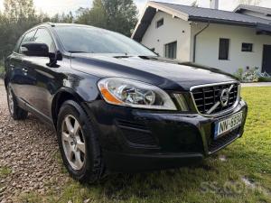Black Volvo XC60 2012 in Riga, with an engine capacity of 2.00 L and mileage of 327 thousand km for 8970 €, photo  on AUTOMOTO.COM.LV