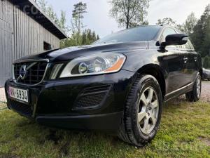 Black Volvo XC60 2012 in Riga, with an engine capacity of 2.00 L and mileage of 327 thousand km for 8970 €, photo 3 on AUTOMOTO.COM.LV