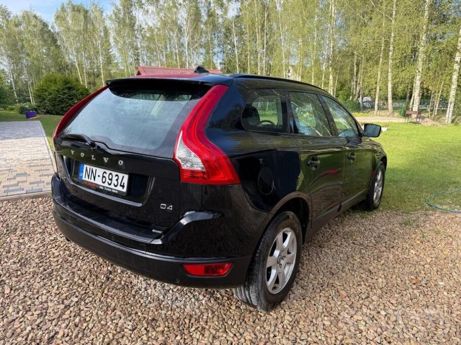 Black Volvo XC60 2012 in Riga, with an engine capacity of 2.00 L and mileage of 327 thousand km for 8970 €, photo 12 on AUTOMOTO.COM.LV
