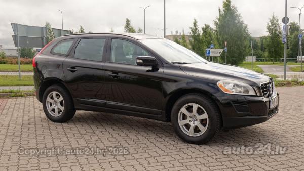 Black Volvo XC60 2012 in Tartu, with an engine capacity of 2.40 L and mileage of 209 thousand km for 10999 €, photo 7 on AUTOMOTO.COM.LV