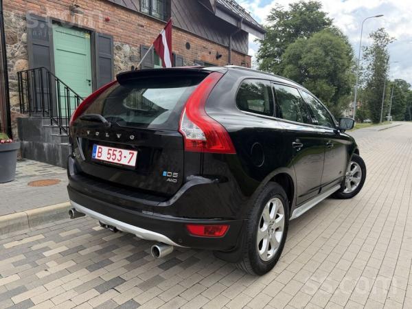 Black Volvo XC60 2012 in Rezekne, with an engine capacity of 2.40 L and mileage of 263 thousand km for 10990 €, photo 5 on AUTOMOTO.COM.LV