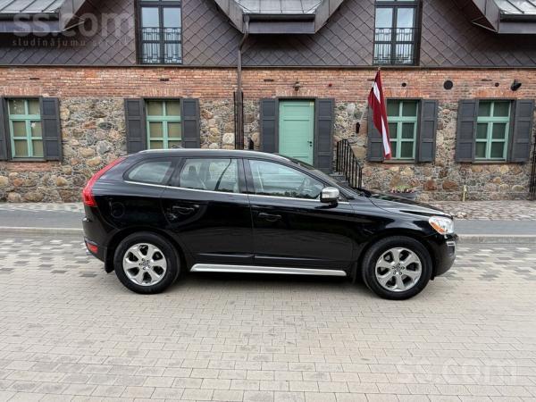 Black Volvo XC60 2012 in Rezekne, with an engine capacity of 2.40 L and mileage of 263 thousand km for 10990 €, photo 6 on AUTOMOTO.COM.LV