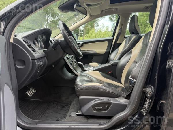 Black Volvo XC60 2012 in Rezekne, with an engine capacity of 2.40 L and mileage of 263 thousand km for 10990 €, photo 7 on AUTOMOTO.COM.LV