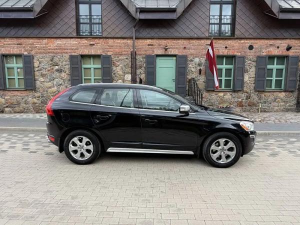 Black Volvo XC60 2012 in Rezekne, with an engine capacity of 2.40 L and mileage of 263 thousand km for 10990 €, photo 6 on AUTOMOTO.COM.LV