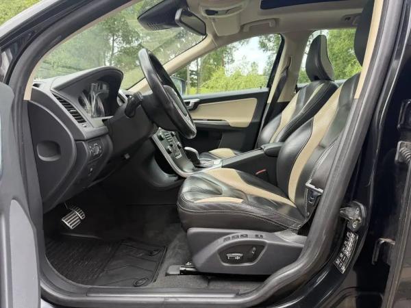 Black Volvo XC60 2012 in Rezekne, with an engine capacity of 2.40 L and mileage of 263 thousand km for 10990 €, photo 7 on AUTOMOTO.COM.LV