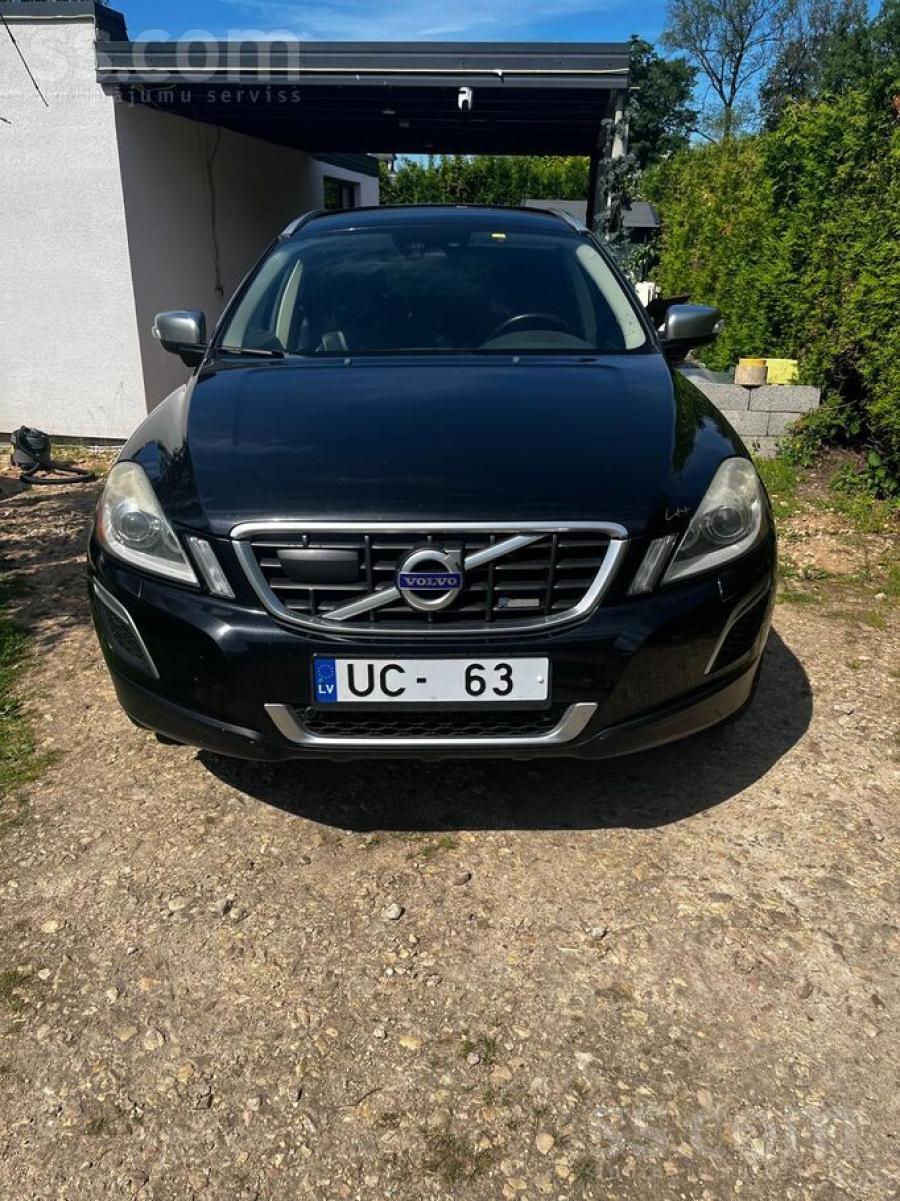 Black Volvo XC60 2012 in Riga, with an engine capacity of 2.40 L and mileage of 265 thousand km for 10500 €, photo 14 on AUTOMOTO.COM.LV