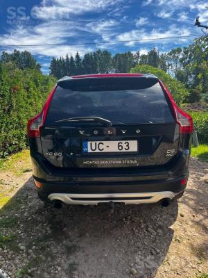 Black Volvo XC60 2012 in Riga, with an engine capacity of 2.40 L and mileage of 265 thousand km for 10500 €, photo 15 on AUTOMOTO.COM.LV