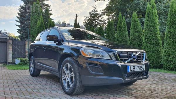 Black Volvo XC60 2012 in Riga, with an engine capacity of 2.40 L and mileage of 205 thousand km for 8200 €, photo 2 on AUTOMOTO.COM.LV
