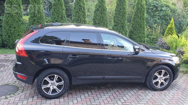 Black Volvo XC60 2012 in Riga, with an engine capacity of 2.40 L and mileage of 205 thousand km for 8200 €, photo 4 on AUTOMOTO.COM.LV