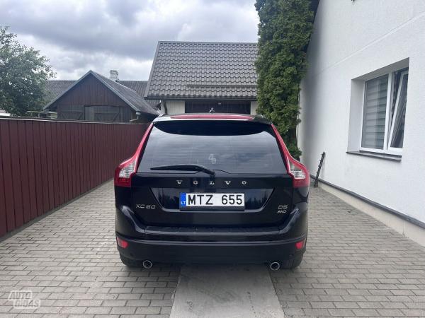 Black Volvo XC60 2012 in Vilnius, with an engine capacity of 2.40 L and mileage of 342 thousand km for 7200 €, photo 5 on AUTOMOTO.COM.LV