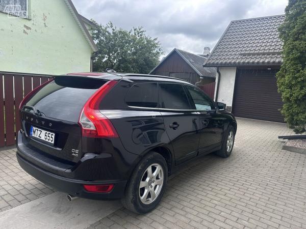 Black Volvo XC60 2012 in Vilnius, with an engine capacity of 2.40 L and mileage of 342 thousand km for 7200 €, photo 7 on AUTOMOTO.COM.LV