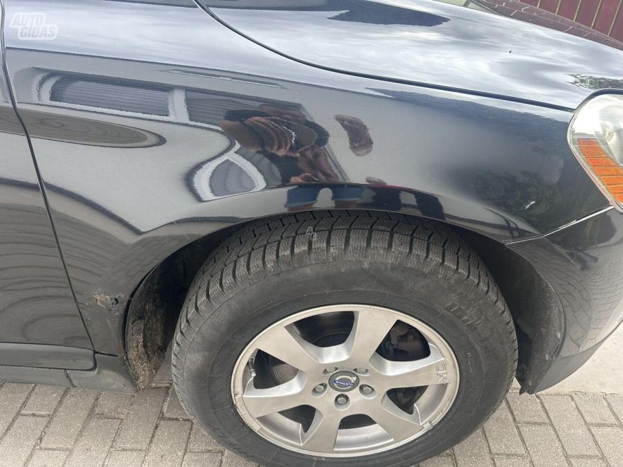 Black Volvo XC60 2012 in Vilnius, with an engine capacity of 2.40 L and mileage of 342 thousand km for 7200 €, photo 11 on AUTOMOTO.COM.LV