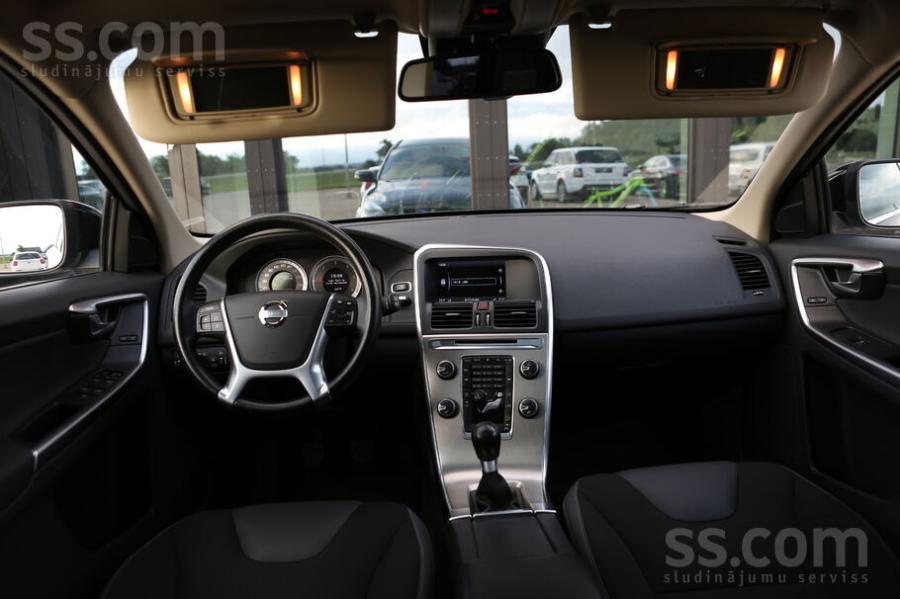 Black Volvo XC60 2012 in Tukums, with an engine capacity of 2.40 L and mileage of 193 thousand km for 10490 €, photo 9 on AUTOMOTO.COM.LV
