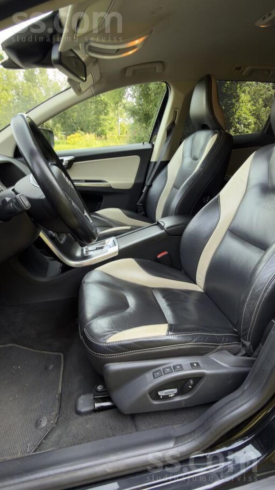 Black Volvo XC60 2012 in Jelgava, with an engine capacity of 2.40 L and mileage of 240 thousand km for 10300 €, photo 6 on AUTOMOTO.COM.LV