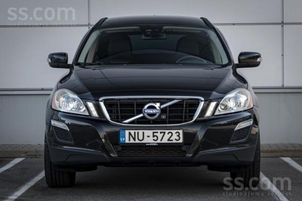 Black Volvo XC60 2012 in Riga, with an engine capacity of 2.00 L and mileage of 254 thousand km for 7990 €, photo 2 on AUTOMOTO.COM.LV