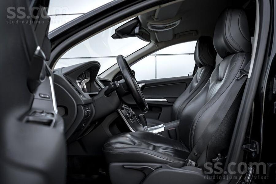 Black Volvo XC60 2012 in Riga, with an engine capacity of 2.00 L and mileage of 254 thousand km for 7990 €, photo 9 on AUTOMOTO.COM.LV