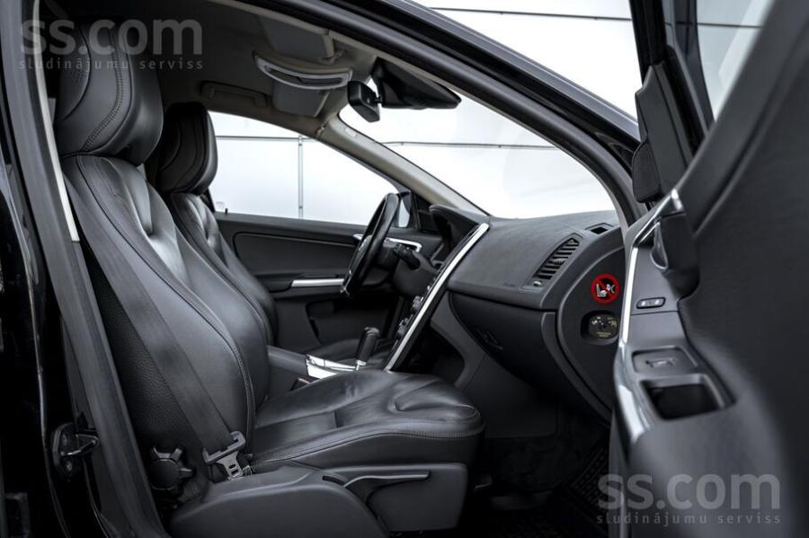 Black Volvo XC60 2012 in Riga, with an engine capacity of 2.00 L and mileage of 254 thousand km for 7990 €, photo 10 on AUTOMOTO.COM.LV