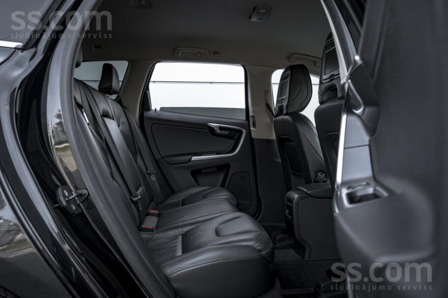Black Volvo XC60 2012 in Riga, with an engine capacity of 2.00 L and mileage of 254 thousand km for 7990 €, photo 12 on AUTOMOTO.COM.LV
