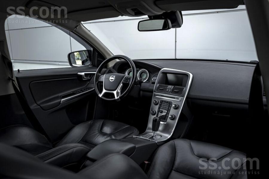 Black Volvo XC60 2012 in Riga, with an engine capacity of 2.00 L and mileage of 254 thousand km for 7990 €, photo 15 on AUTOMOTO.COM.LV