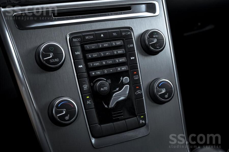 Black Volvo XC60 2012 in Riga, with an engine capacity of 2.00 L and mileage of 254 thousand km for 7990 €, photo 23 on AUTOMOTO.COM.LV