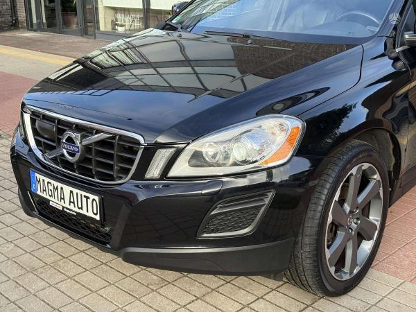 Black Volvo XC60 2012 in Marijampole, with an engine capacity of 2.40 L and mileage of 289 thousand km for 12450 €, photo 6 on AUTOMOTO.COM.LV