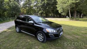 Black Volvo XC60 2012 in Jelgava, with an engine capacity of 2.40 L and mileage of 240 thousand km for 10300 €, photo 7 on AUTOMOTO.COM.LV