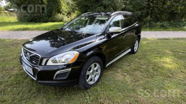 Black Volvo XC60 2012 in Jelgava, with an engine capacity of 2.40 L and mileage of 240 thousand km for 10300 €, photo 8 on AUTOMOTO.COM.LV